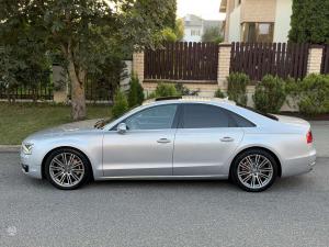 Grey Audi A8 2014 in Vilnius, with an engine capacity of 4.13 L and mileage of 280 thousand km for 11950 €, photo 13 on AUTOMOTO.COM.LV