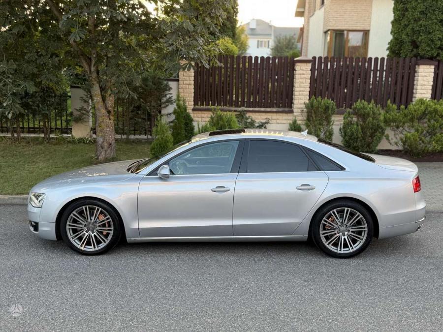 Grey Audi A8 2014 in Vilnius, with an engine capacity of 4.13 L and mileage of 280 thousand km for 11950 €, photo 13 on AUTOMOTO.COM.LV