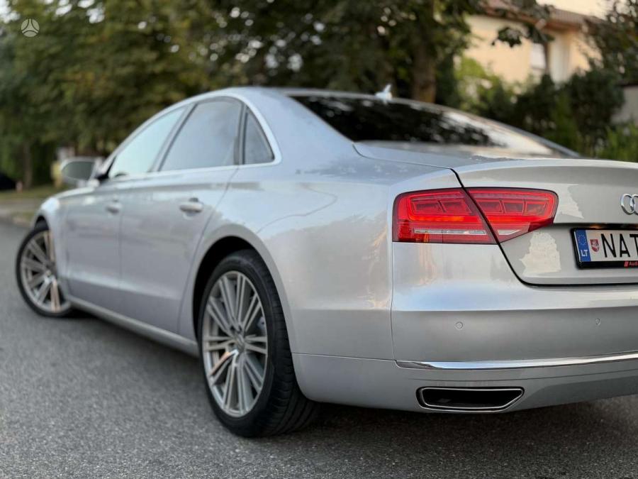 Grey Audi A8 2014 in Vilnius, with an engine capacity of 4.13 L and mileage of 280 thousand km for 11950 €, photo 16 on AUTOMOTO.COM.LV