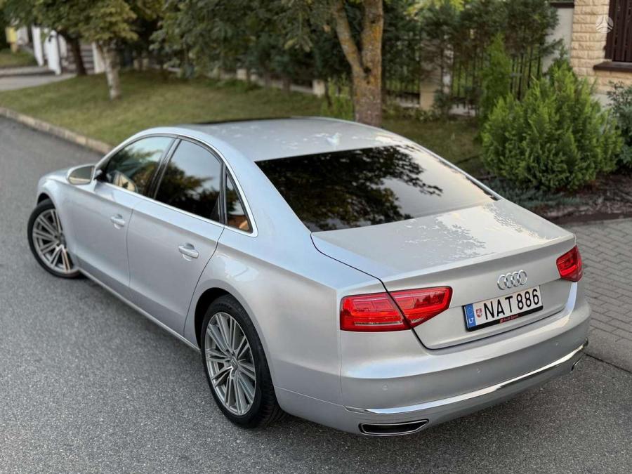 Grey Audi A8 2014 in Vilnius, with an engine capacity of 4.13 L and mileage of 280 thousand km for 11950 €, photo 17 on AUTOMOTO.COM.LV