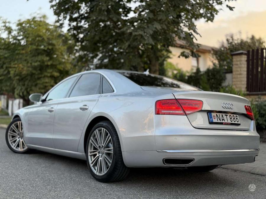 Grey Audi A8 2014 in Vilnius, with an engine capacity of 4.13 L and mileage of 280 thousand km for 11950 €, photo 19 on AUTOMOTO.COM.LV