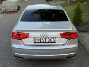 Grey Audi A8 2014 in Vilnius, with an engine capacity of 4.13 L and mileage of 280 thousand km for 11950 €, photo 21 on AUTOMOTO.COM.LV