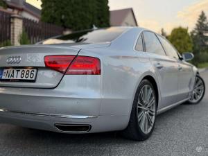 Grey Audi A8 2014 in Vilnius, with an engine capacity of 4.13 L and mileage of 280 thousand km for 11950 €, photo 24 on AUTOMOTO.COM.LV