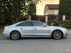 Grey Audi A8 2014 in Vilnius, with an engine capacity of 4.13 L and mileage of 280 thousand km for 11950 €, photo 29 on AUTOMOTO.COM.LV