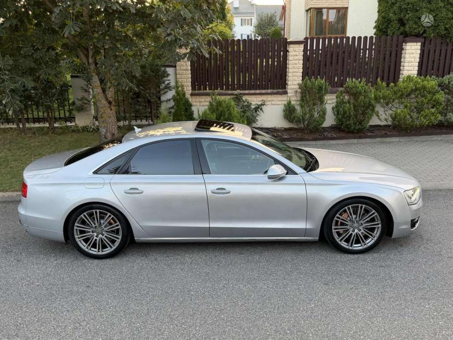 Grey Audi A8 2014 in Vilnius, with an engine capacity of 4.13 L and mileage of 280 thousand km for 11950 €, photo 30 on AUTOMOTO.COM.LV
