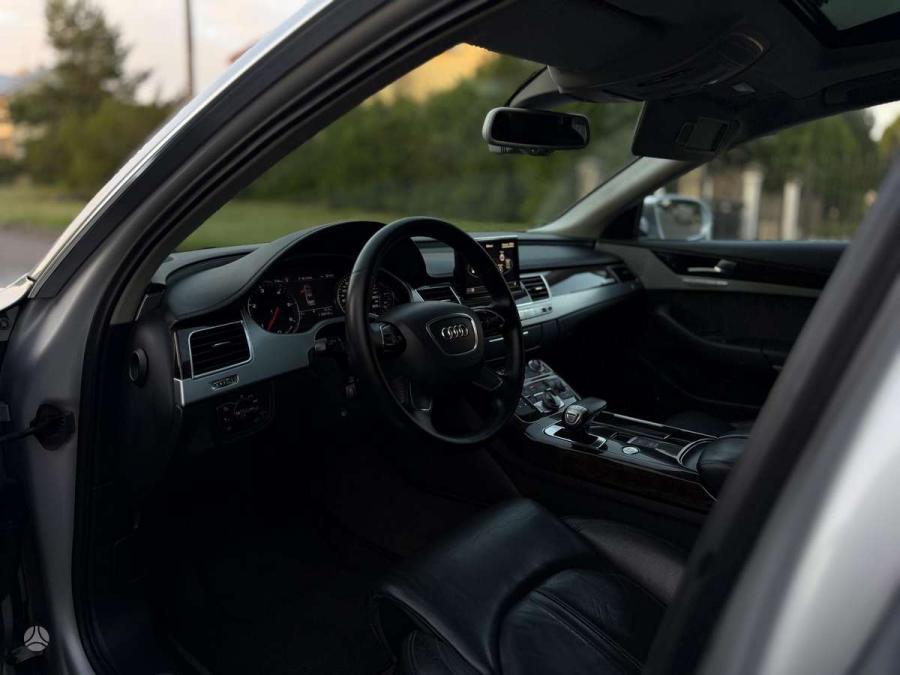 Grey Audi A8 2014 in Vilnius, with an engine capacity of 4.13 L and mileage of 280 thousand km for 11950 €, photo 38 on AUTOMOTO.COM.LV