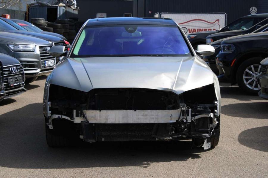 Grey Audi A8 2016 in Vilnius, with an engine capacity of 3.99 L and mileage of 163 thousand km for 10400 €, photo 6 on AUTOMOTO.COM.LV