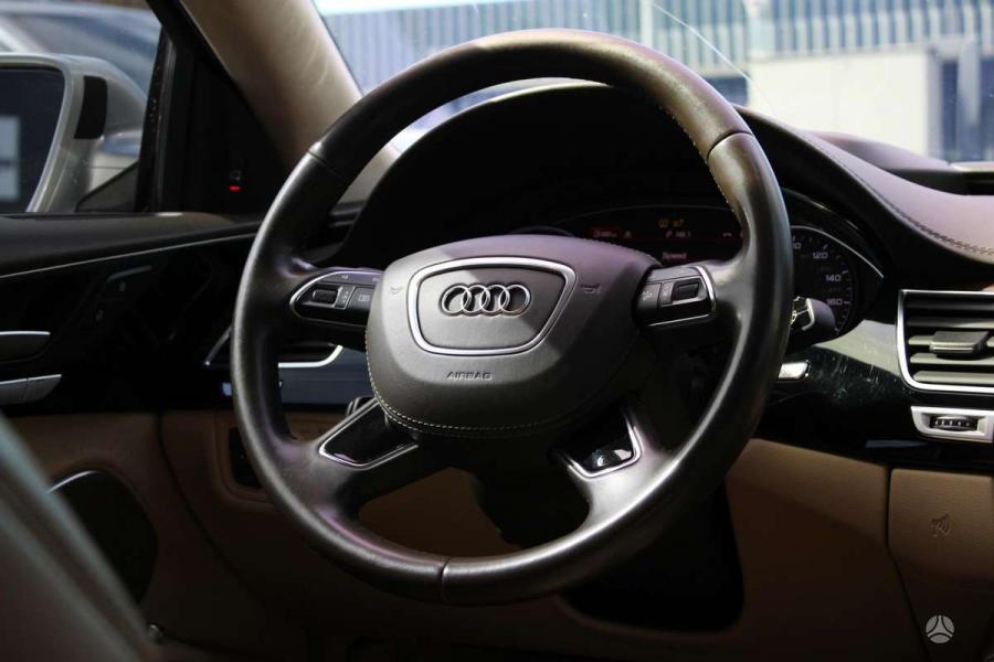 Grey Audi A8 2016 in Vilnius, with an engine capacity of 3.99 L and mileage of 163 thousand km for 10400 €, photo 17 on AUTOMOTO.COM.LV