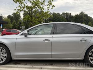 Grey Audi A8 2016 in Riga, with an engine capacity of 3.00 L and mileage of 112 thousand km for 29500 €, photo 9 on AUTOMOTO.COM.LV