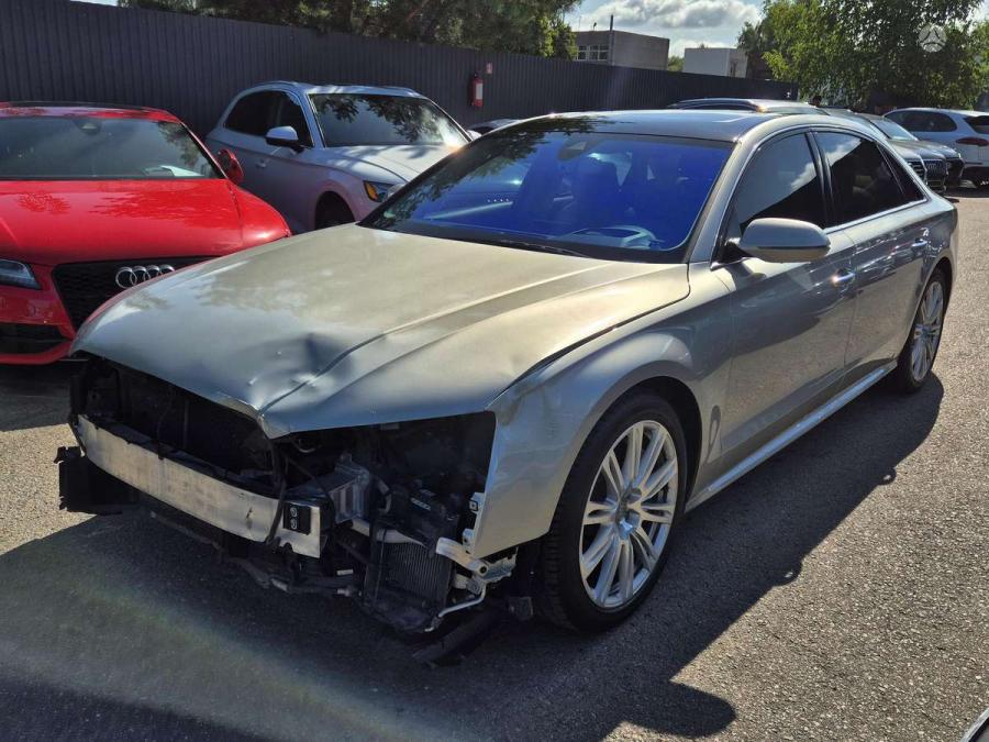 Grey Audi A8 2016 in Vilnius, with an engine capacity of 3.99 L and mileage of 163 thousand km for 9900 €, photo 4 on AUTOMOTO.COM.LV