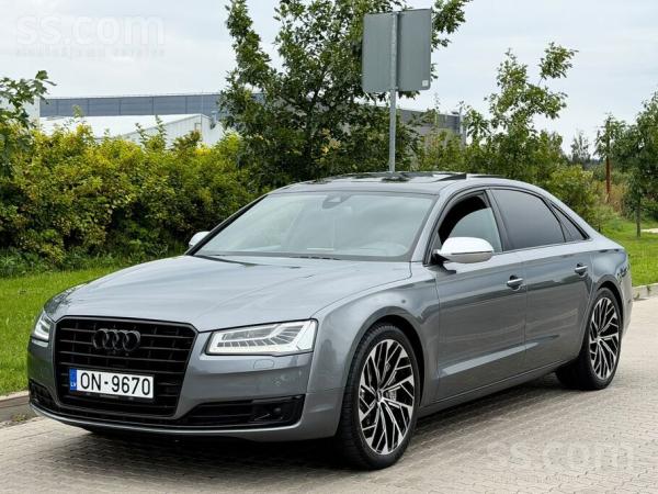 Grey Audi A8 2016 in Riga, with an engine capacity of 3.00 L and mileage of 213 thousand km for 19900 €, photo 1 on AUTOMOTO.COM.LV