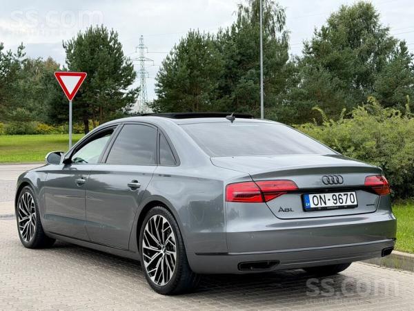 Grey Audi A8 2016 in Riga, with an engine capacity of 3.00 L and mileage of 213 thousand km for 19900 €, photo 4 on AUTOMOTO.COM.LV