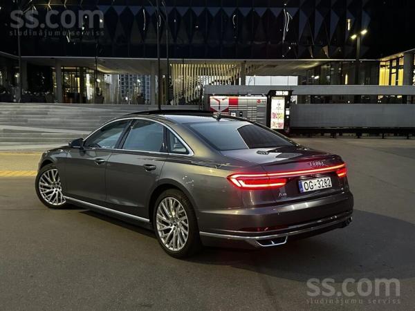 Grey Audi A8 2018 in Riga, with an engine capacity of 3.00 L and mileage of 265 thousand km for 34200 €, photo 5 on AUTOMOTO.COM.LV