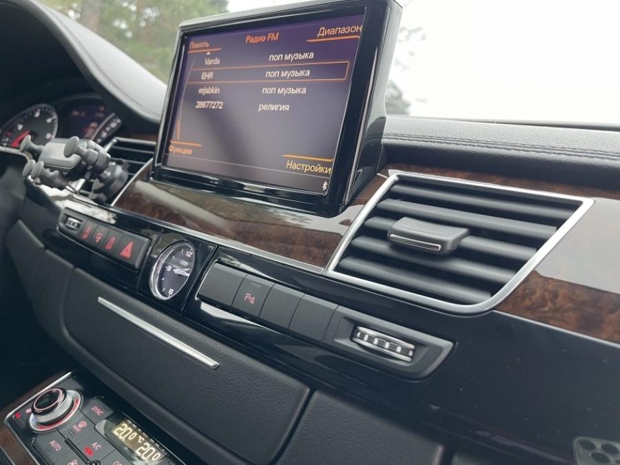 Red Audi A8 2014 in Riga, with an engine capacity of 3.00 L and mileage of 208 thousand km for 19350 €, photo 4 on AUTOMOTO.COM.LV