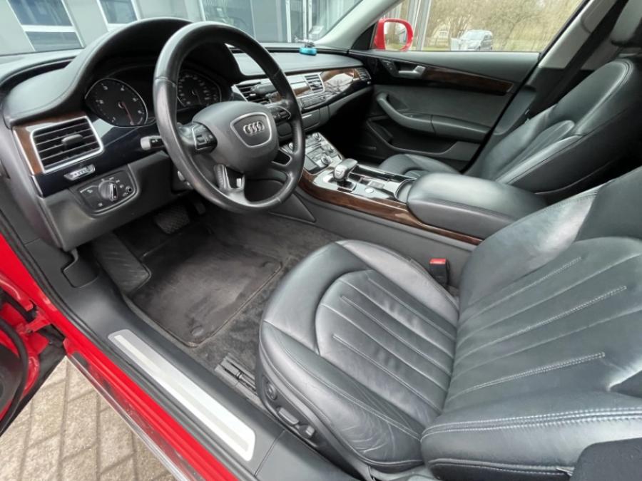Red Audi A8 2014 in Riga, with an engine capacity of 3.00 L and mileage of 208 thousand km for 19350 €, photo 18 on AUTOMOTO.COM.LV