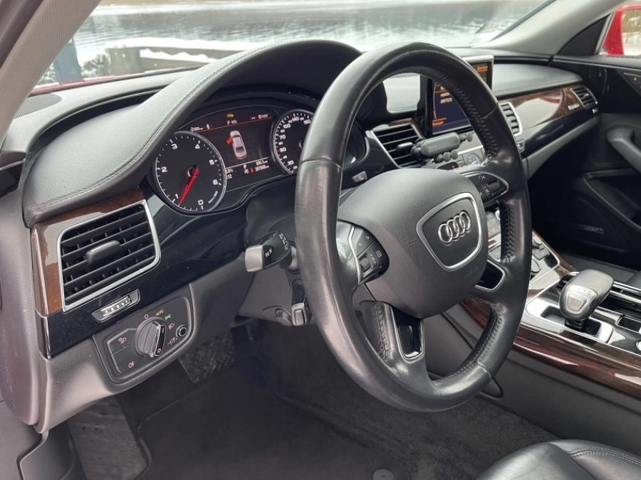 Red Audi A8 2014 in Riga, with an engine capacity of 3.00 L and mileage of 208 thousand km for 19350 €, photo 32 on AUTOMOTO.COM.LV