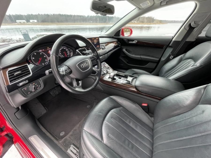 Red Audi A8 2014 in Riga, with an engine capacity of 3.00 L and mileage of 208 thousand km for 19350 €, photo 34 on AUTOMOTO.COM.LV