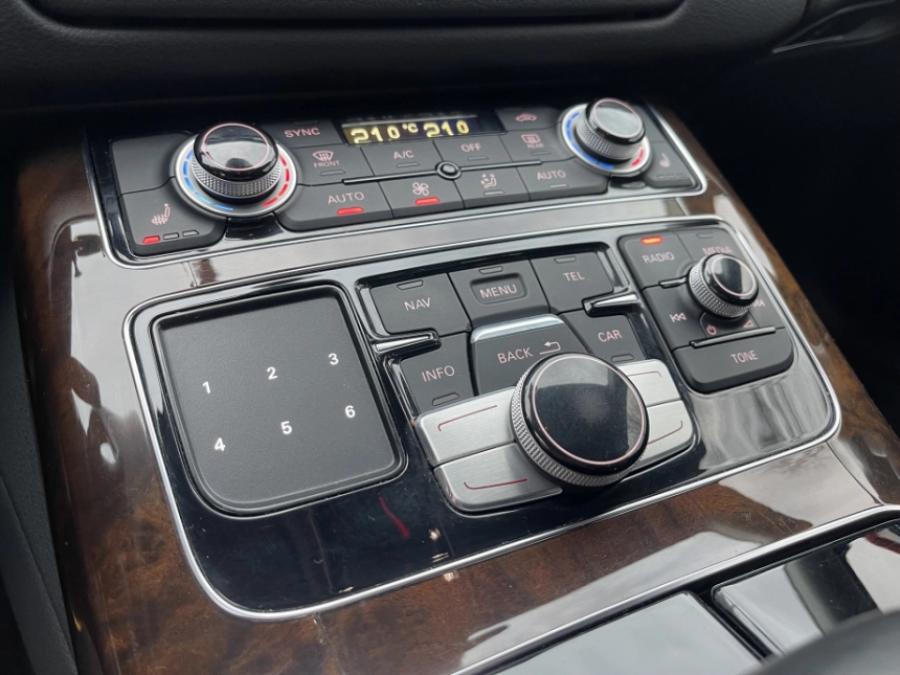 Red Audi A8 2014 in Riga, with an engine capacity of 3.00 L and mileage of 208 thousand km for 19350 €, photo 47 on AUTOMOTO.COM.LV