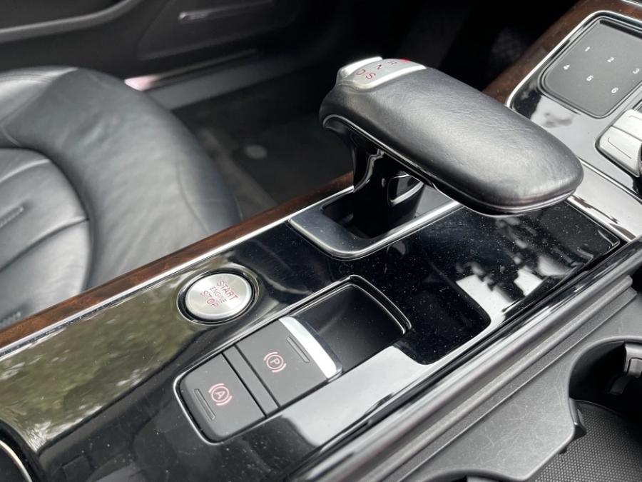 Red Audi A8 2014 in Riga, with an engine capacity of 3.00 L and mileage of 208 thousand km for 19350 €, photo 52 on AUTOMOTO.COM.LV