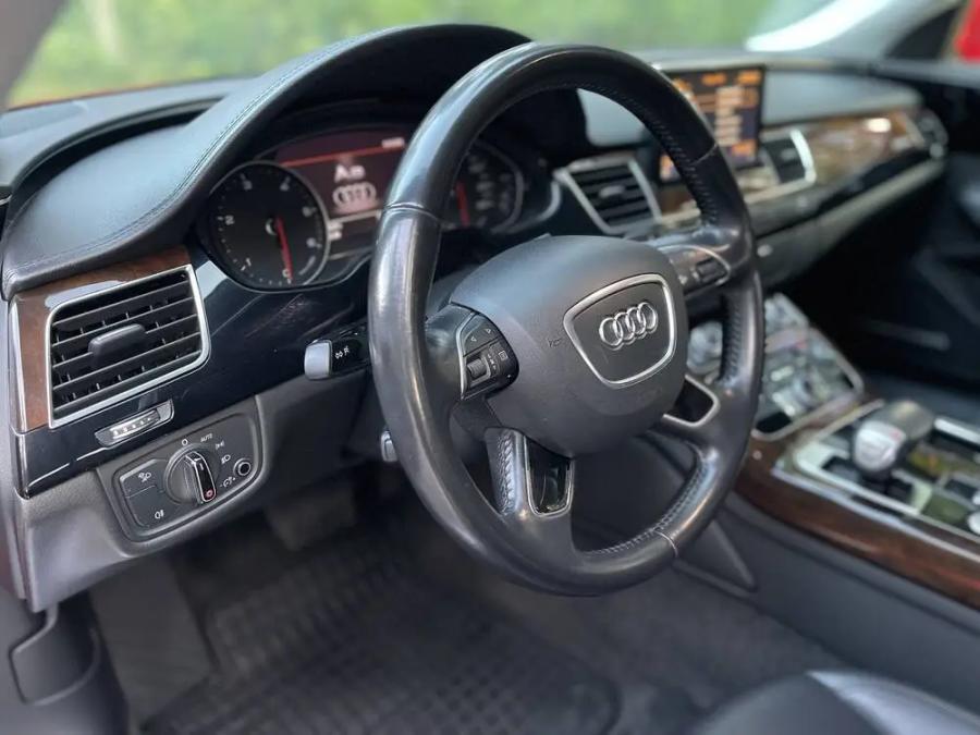 Red Audi A8 2014 in Jurmala, with an engine capacity of 3.00 L and mileage of 229 thousand km for 17650 €, photo 22 on AUTOMOTO.COM.LV