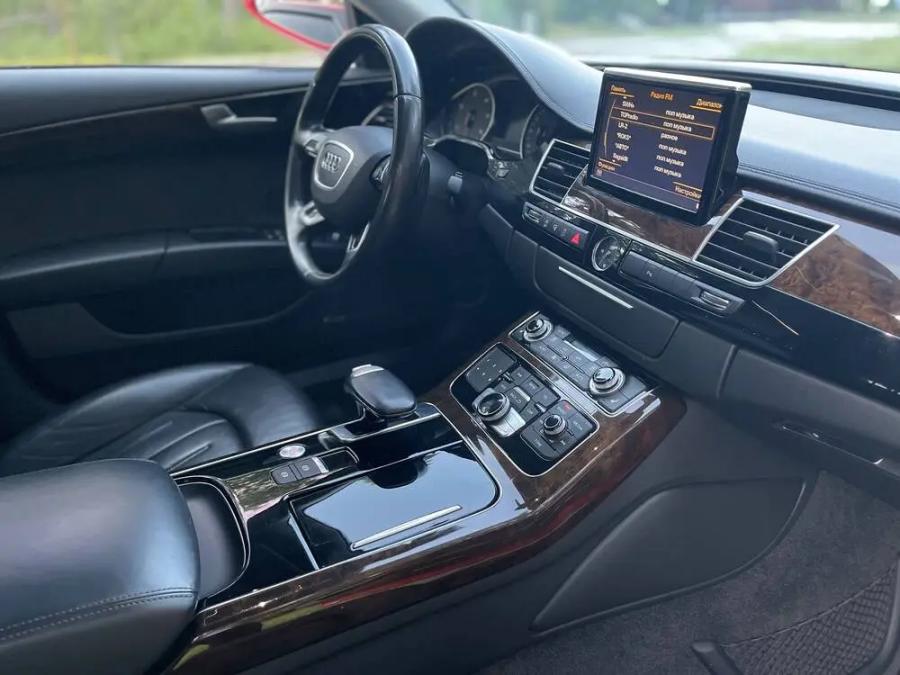 Red Audi A8 2014 in Jurmala, with an engine capacity of 3.00 L and mileage of 229 thousand km for 17650 €, photo 34 on AUTOMOTO.COM.LV