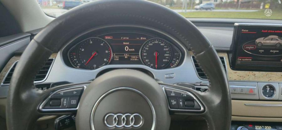 Audi A8 2010 in Panevezys, with an engine capacity of 4.13 L and mileage of 313 thousand km for 11300 €, photo 8 on AUTOMOTO.COM.LV