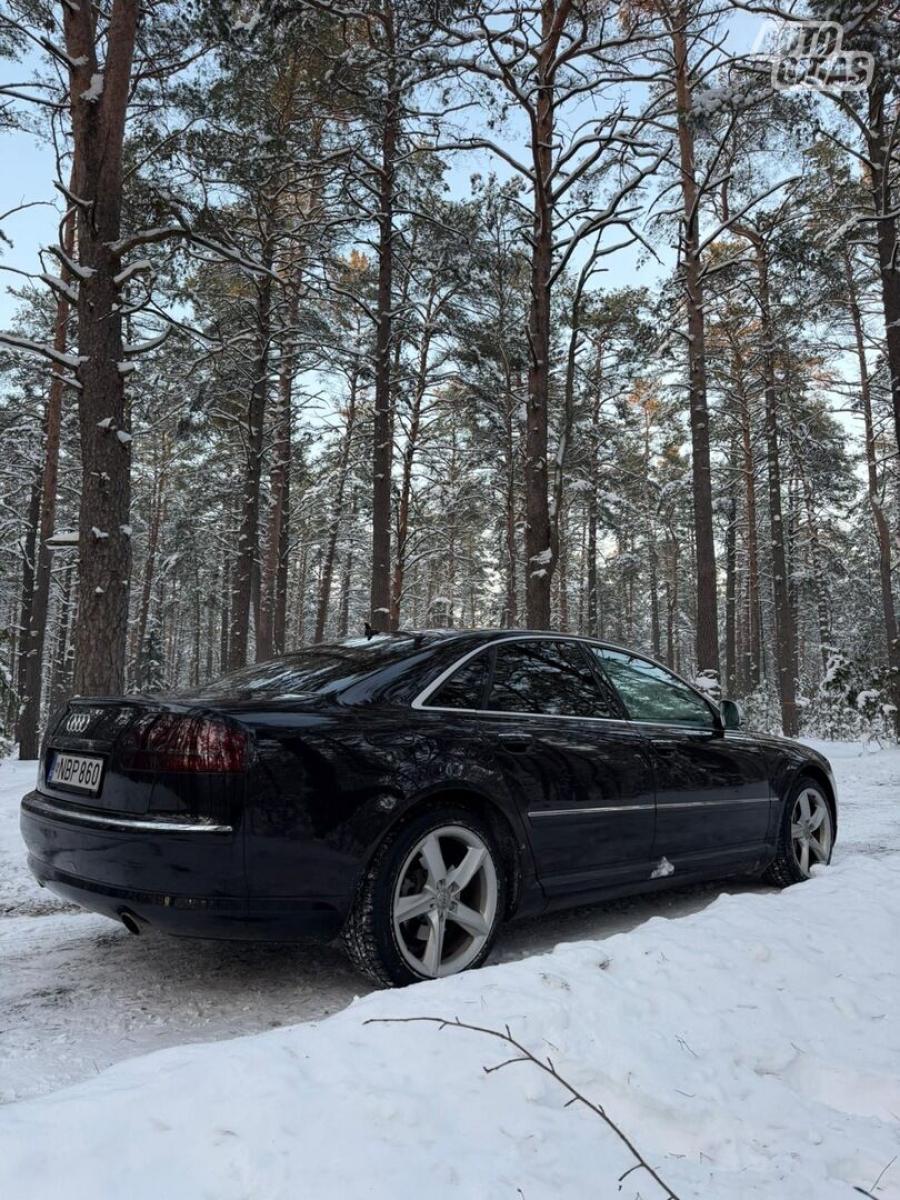 Violet Audi A8 2008 in Druskininkai, with an engine capacity of 4.10 L and mileage of 378 thousand km for 5499 €, photo 13 on AUTOMOTO.COM.LV