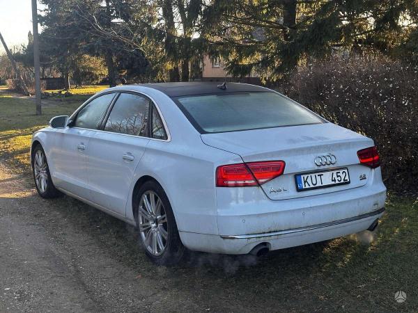 White Audi A8 2012 in Ukmerge, with an engine capacity of 4.20 L and mileage of 170 thousand km for 7300 €, photo 4 on AUTOMOTO.COM.LV
