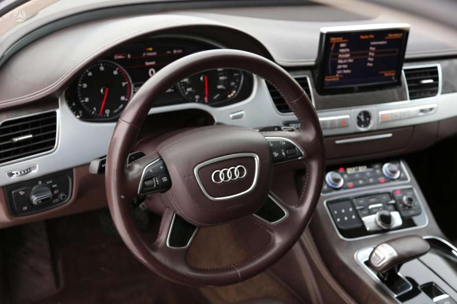 White Audi A8 2013 in Vilnius, with an engine capacity of 4.00 L and mileage of 164 thousand km for 13990 €, photo 13 on AUTOMOTO.COM.LV