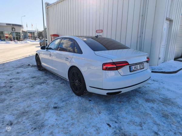 White Audi A8 2014 in Kaunas, with an engine capacity of 3.00 L and mileage of 225 thousand km for 16400 €, photo 2 on AUTOMOTO.COM.LV