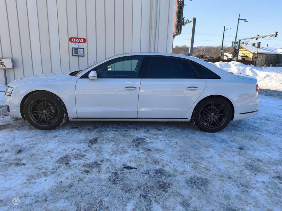 White Audi A8 2014 in Kaunas, with an engine capacity of 3.00 L and mileage of 225 thousand km for 16400 €, photo 3 on AUTOMOTO.COM.LV