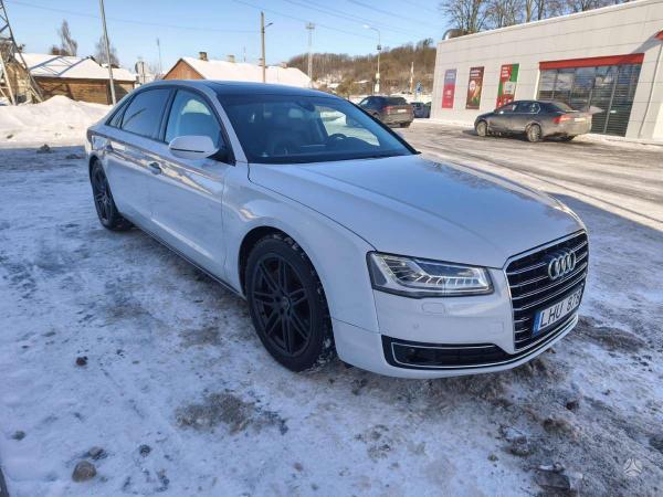White Audi A8 2014 in Kaunas, with an engine capacity of 3.00 L and mileage of 225 thousand km for 16400 €, photo 6 on AUTOMOTO.COM.LV