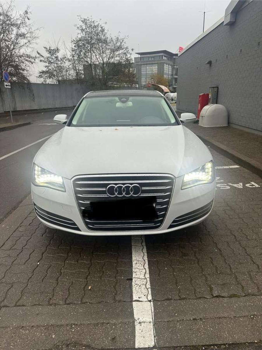 White Audi A8 2014 in Vilnius, with an engine capacity of 3.00 L and mileage of 240 thousand km for 1950 €, photo 1 on AUTOMOTO.COM.LV