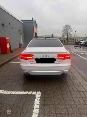 White Audi A8 2014 in Vilnius, with an engine capacity of 3.00 L and mileage of 240 thousand km for 1950 €, photo 3 on AUTOMOTO.COM.LV
