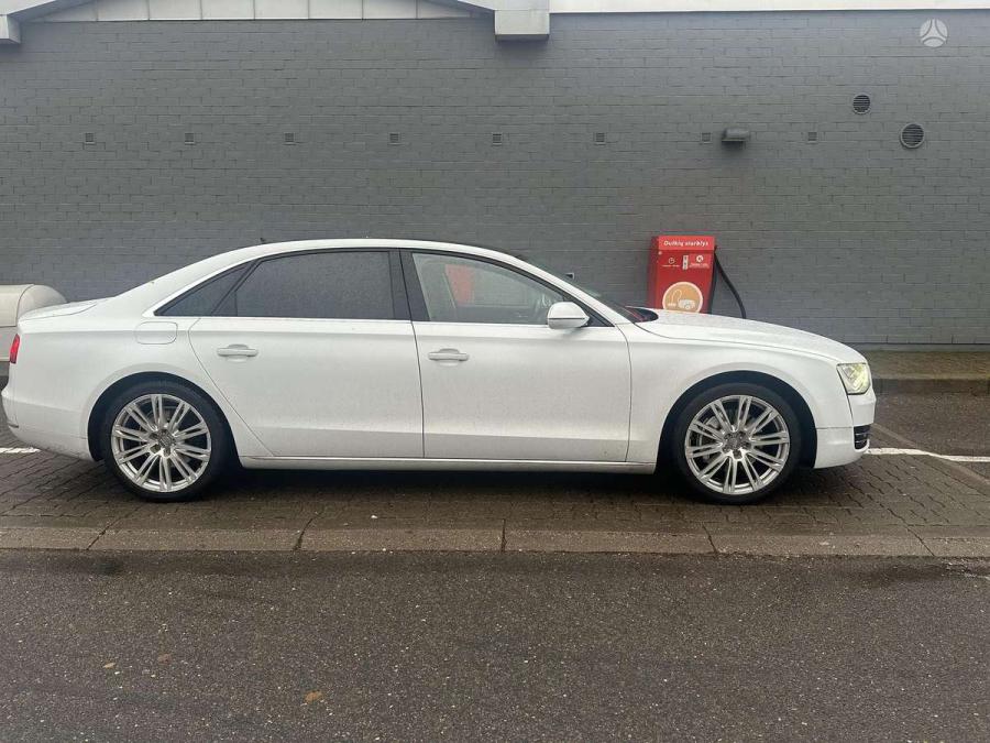 White Audi A8 2014 in Vilnius, with an engine capacity of 3.00 L and mileage of 240 thousand km for 1950 €, photo 4 on AUTOMOTO.COM.LV