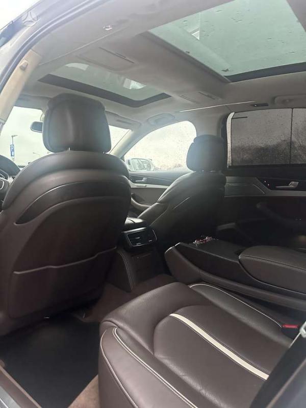 White Audi A8 2014 in Vilnius, with an engine capacity of 3.00 L and mileage of 240 thousand km for 1950 €, photo 5 on AUTOMOTO.COM.LV