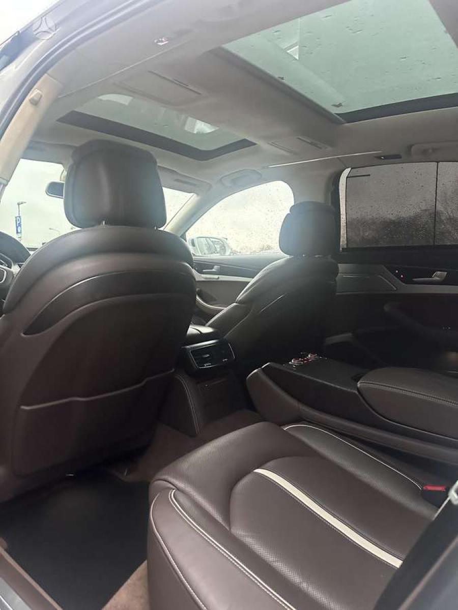 White Audi A8 2014 in Vilnius, with an engine capacity of 3.00 L and mileage of 240 thousand km for 1950 €, photo 6 on AUTOMOTO.COM.LV