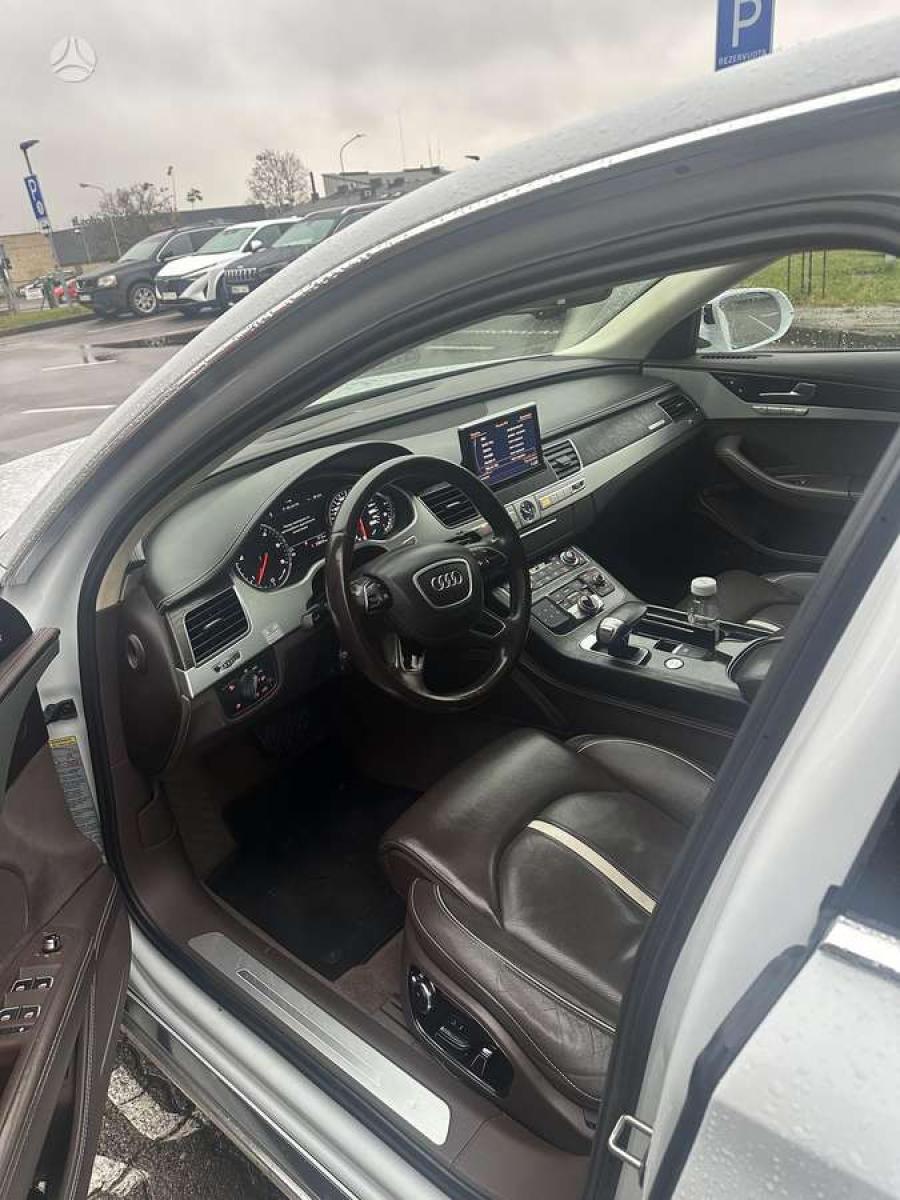 White Audi A8 2014 in Vilnius, with an engine capacity of 3.00 L and mileage of 240 thousand km for 1950 €, photo 7 on AUTOMOTO.COM.LV