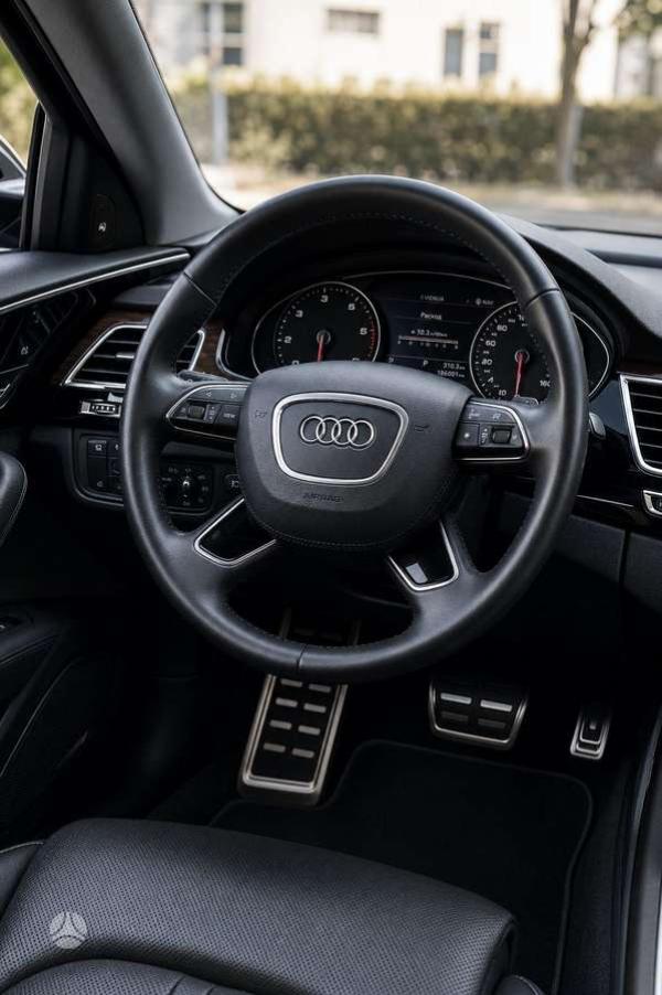 White Audi A8 2015 in Klaipeda, with an engine capacity of 4.00 L and mileage of 186 thousand km for 25500 €, photo 7 on AUTOMOTO.COM.LV
