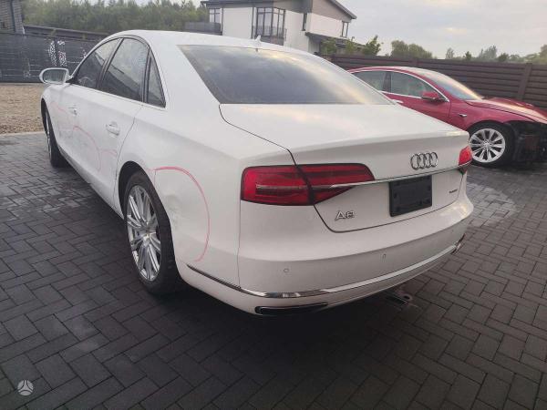 White Audi A8 2015 in Taurage, with an engine capacity of 3.00 L and mileage of 234 thousand km for 8200 €, photo 4 on AUTOMOTO.COM.LV
