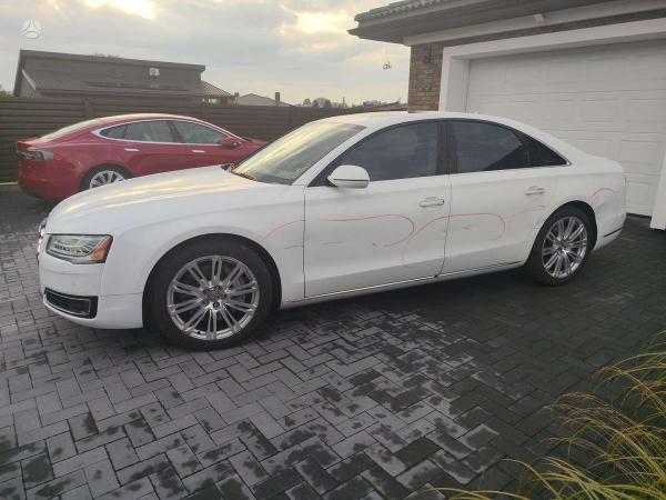 White Audi A8 2015 in Taurage, with an engine capacity of 3.00 L and mileage of 234 thousand km for 8200 €, photo 5 on AUTOMOTO.COM.LV
