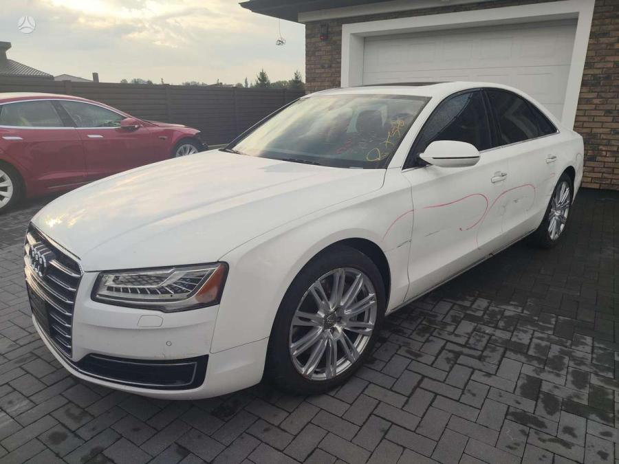 White Audi A8 2015 in Taurage, with an engine capacity of 3.00 L and mileage of 234 thousand km for 8200 €, photo 7 on AUTOMOTO.COM.LV