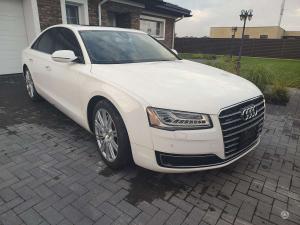 White Audi A8 2015 in Taurage, with an engine capacity of 3.00 L and mileage of 234 thousand km for 8200 €, photo 14 on AUTOMOTO.COM.LV