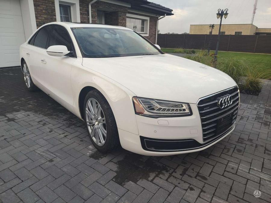 White Audi A8 2015 in Taurage, with an engine capacity of 3.00 L and mileage of 234 thousand km for 8200 €, photo 14 on AUTOMOTO.COM.LV