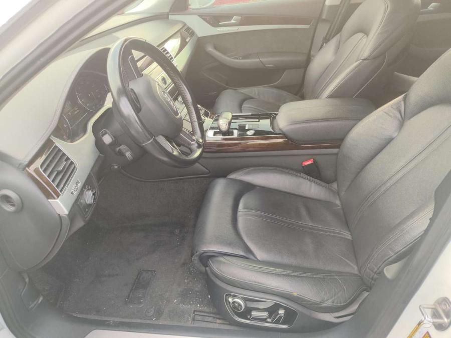 White Audi A8 2015 in Taurage, with an engine capacity of 3.00 L and mileage of 234 thousand km for 8200 €, photo 16 on AUTOMOTO.COM.LV