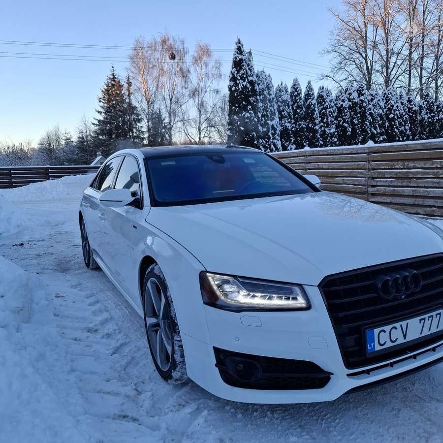 White Audi A8 2018 in Kaisiadorys, with an engine capacity of 4.00 L and mileage of 107 thousand km for 25000 €, photo 1 on AUTOMOTO.COM.LV