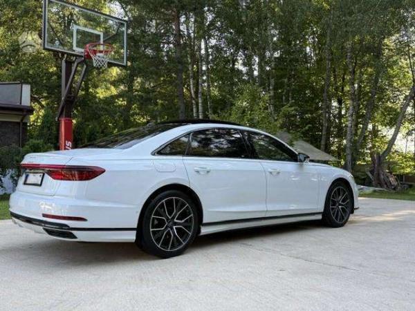 White Audi A8 2019 in Vilnius, with an engine capacity of 2.97 L and mileage of 185 thousand km for 46700 €, photo 6 on AUTOMOTO.COM.LV