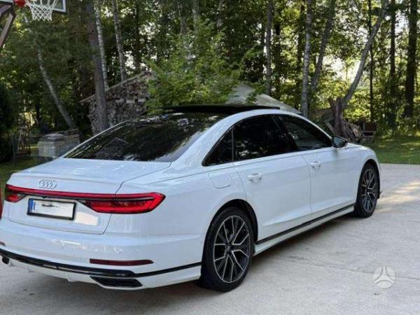 White Audi A8 2019 in Vilnius, with an engine capacity of 2.97 L and mileage of 185 thousand km for 46700 €, photo 7 on AUTOMOTO.COM.LV