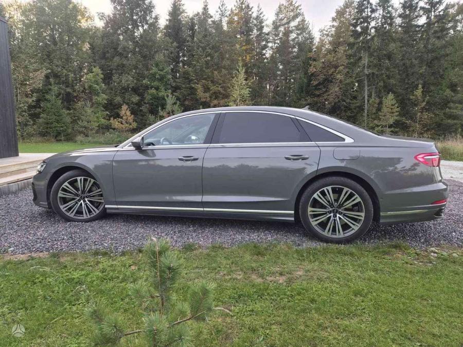 White Audi A8 2023 in Tallinn, with an engine capacity of 3.00 L and mileage of 130 thousand km for 59000 €, photo 4 on AUTOMOTO.COM.LV
