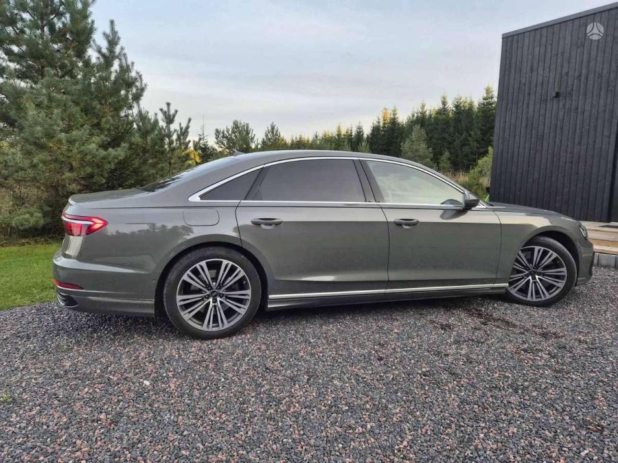 White Audi A8 2023 in Tallinn, with an engine capacity of 3.00 L and mileage of 130 thousand km for 59000 €, photo 5 on AUTOMOTO.COM.LV